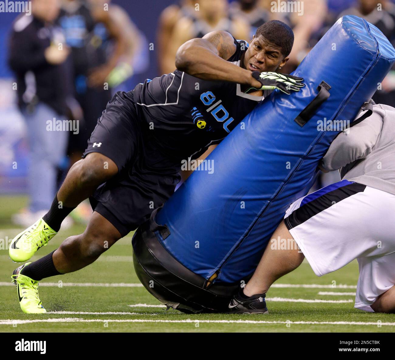 Missouri defensive lineman Kony Ealy runs a drill at the NFL football ...