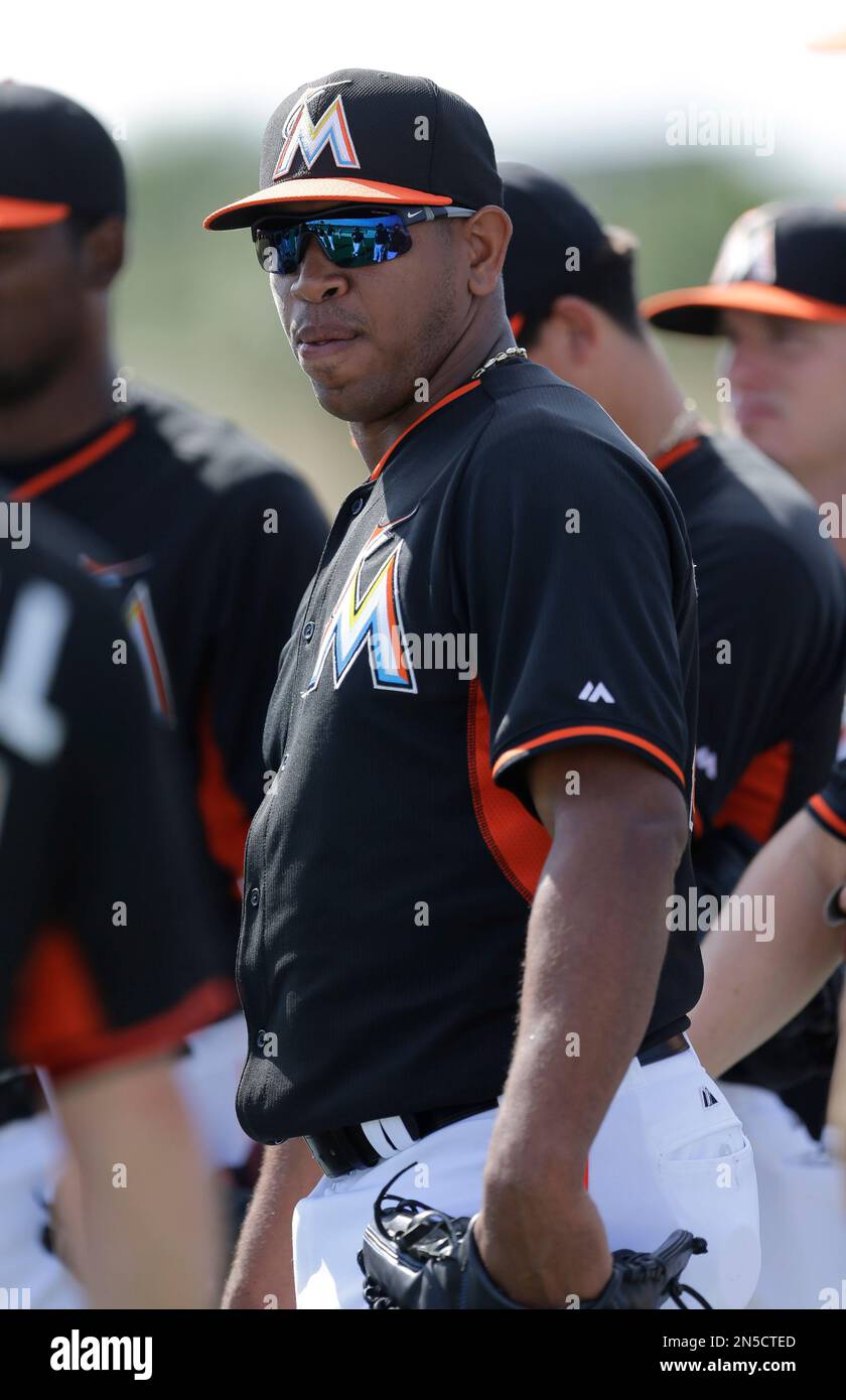 Miami Marlins pitcher Carlos Marmol warms up at the start of a spring ...