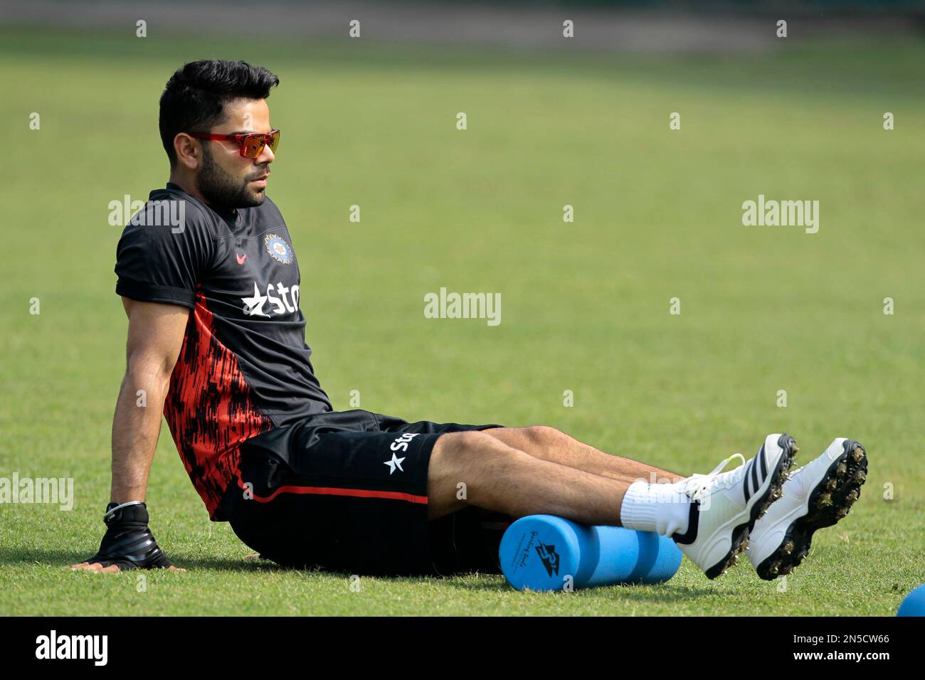 India cricket team captain Virat Kohli stretches during a practice ...
