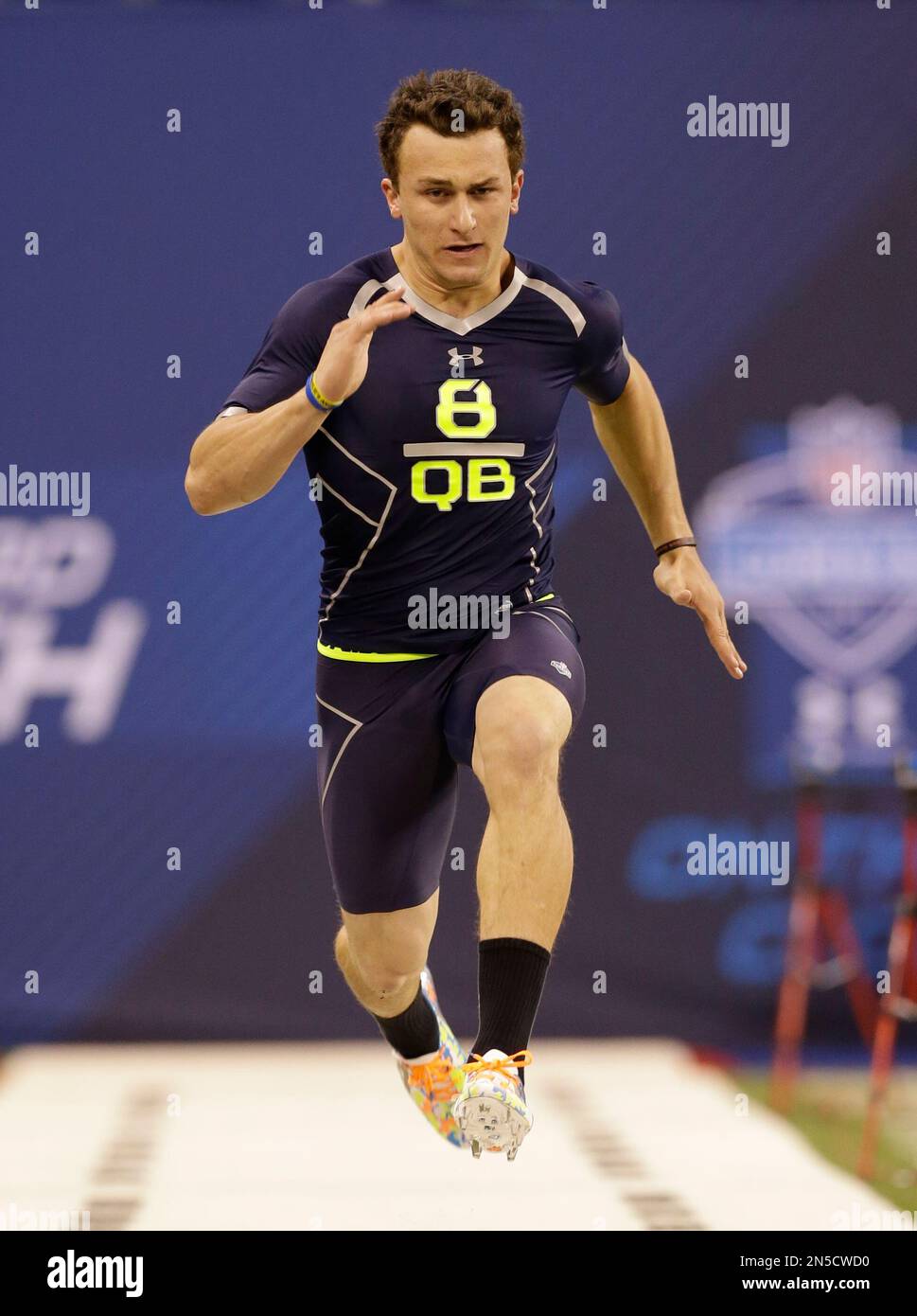 Texas A&M quarterback Johnny Manziel runs a drill at the NFL football ...