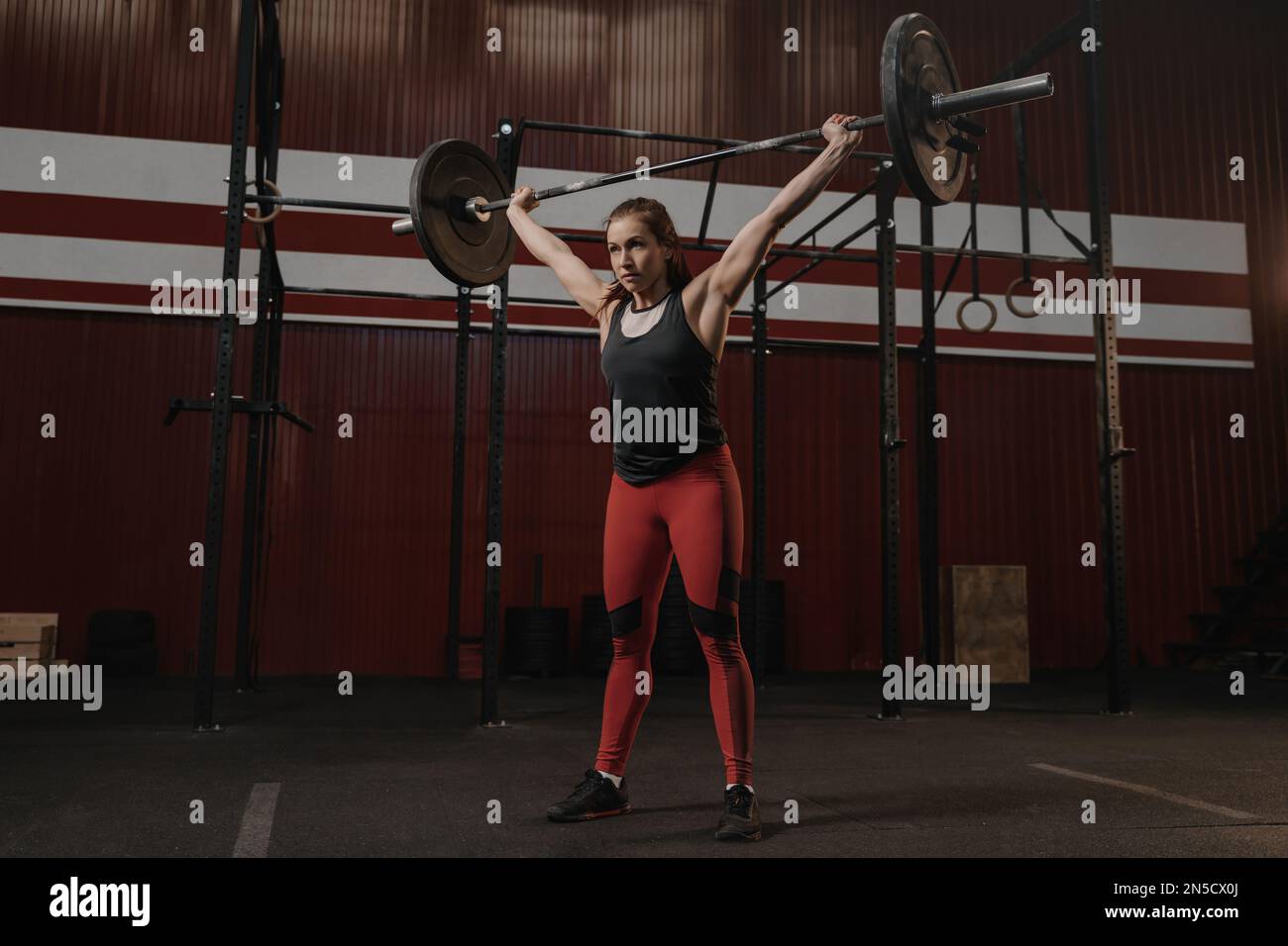 Female weight lifter overhead hi-res stock photography and images - Alamy