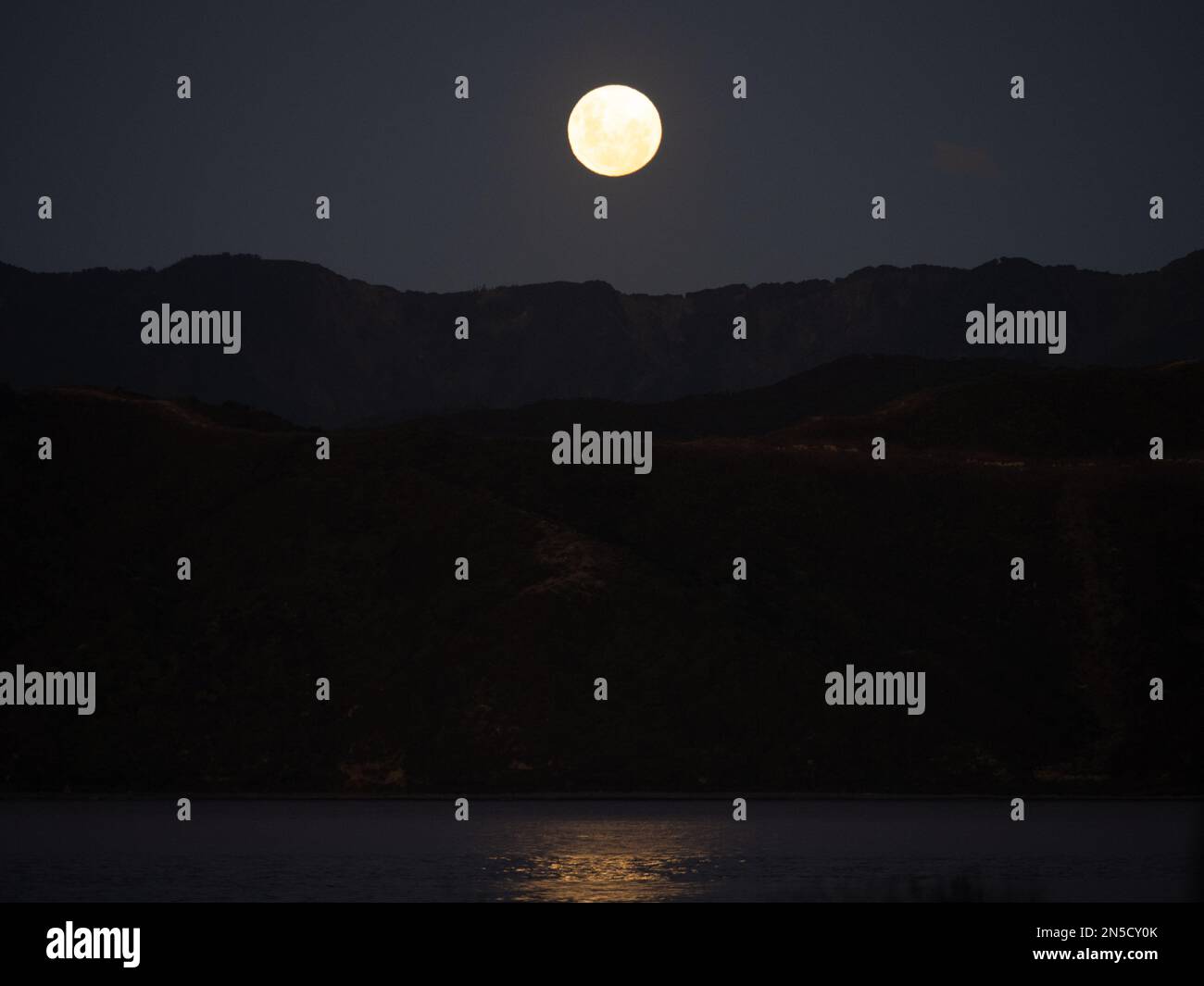 Moon rising over mountains, New Zealand Stock Photo - Alamy