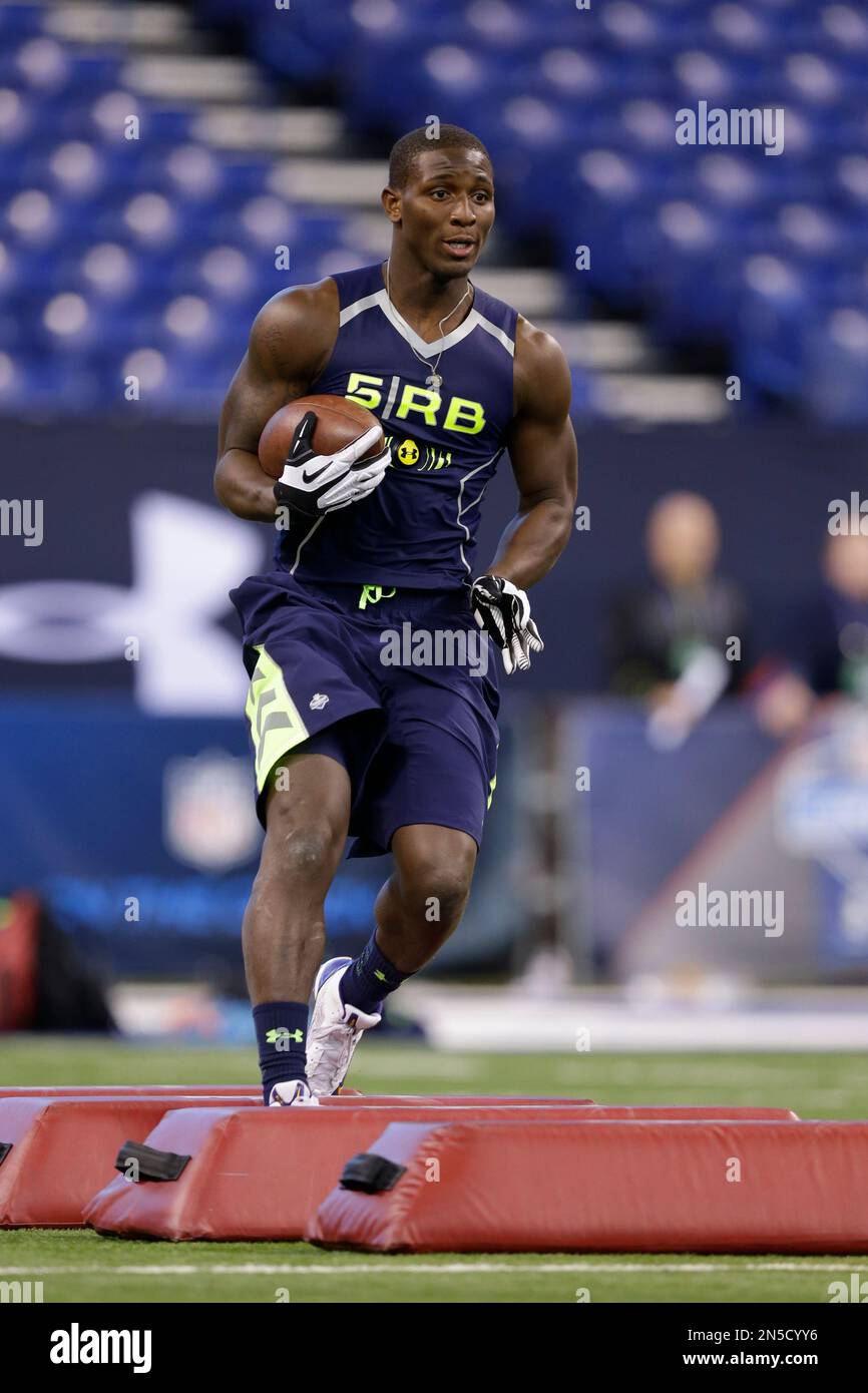Louisiana State running back Alfred Blue runs a drill at the NFL ...