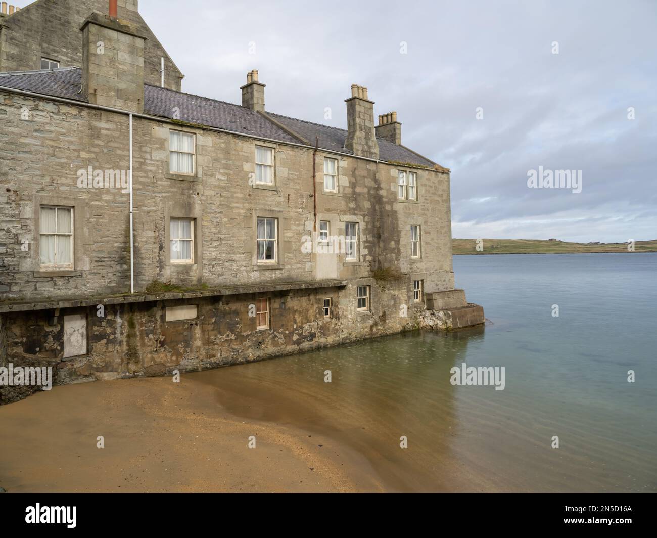 Houses built at sea level in Lerwick, Shetland Stock Photo - Alamy