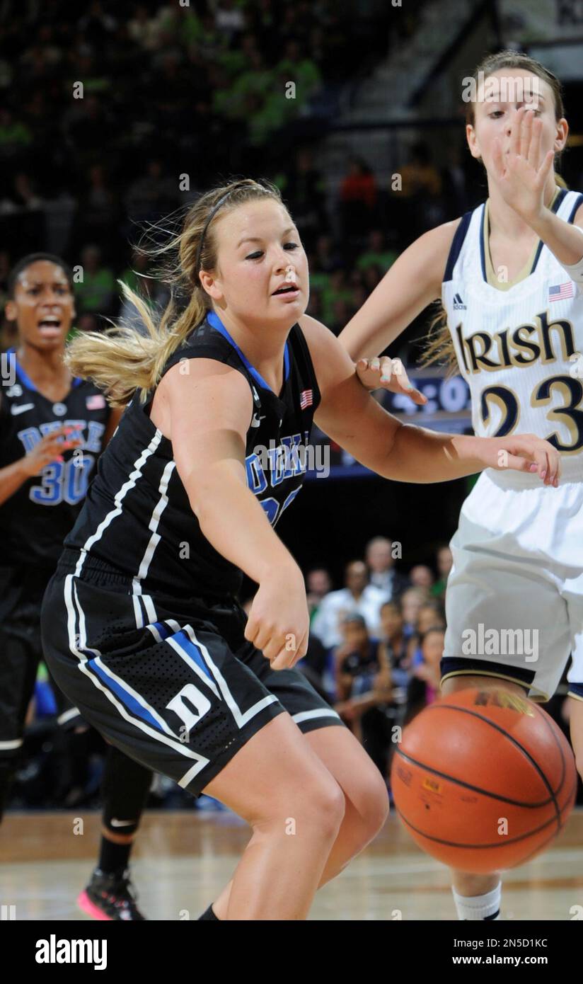 Duke guard Tricia Liston, left, drives the lane as Notre Dame guard ...