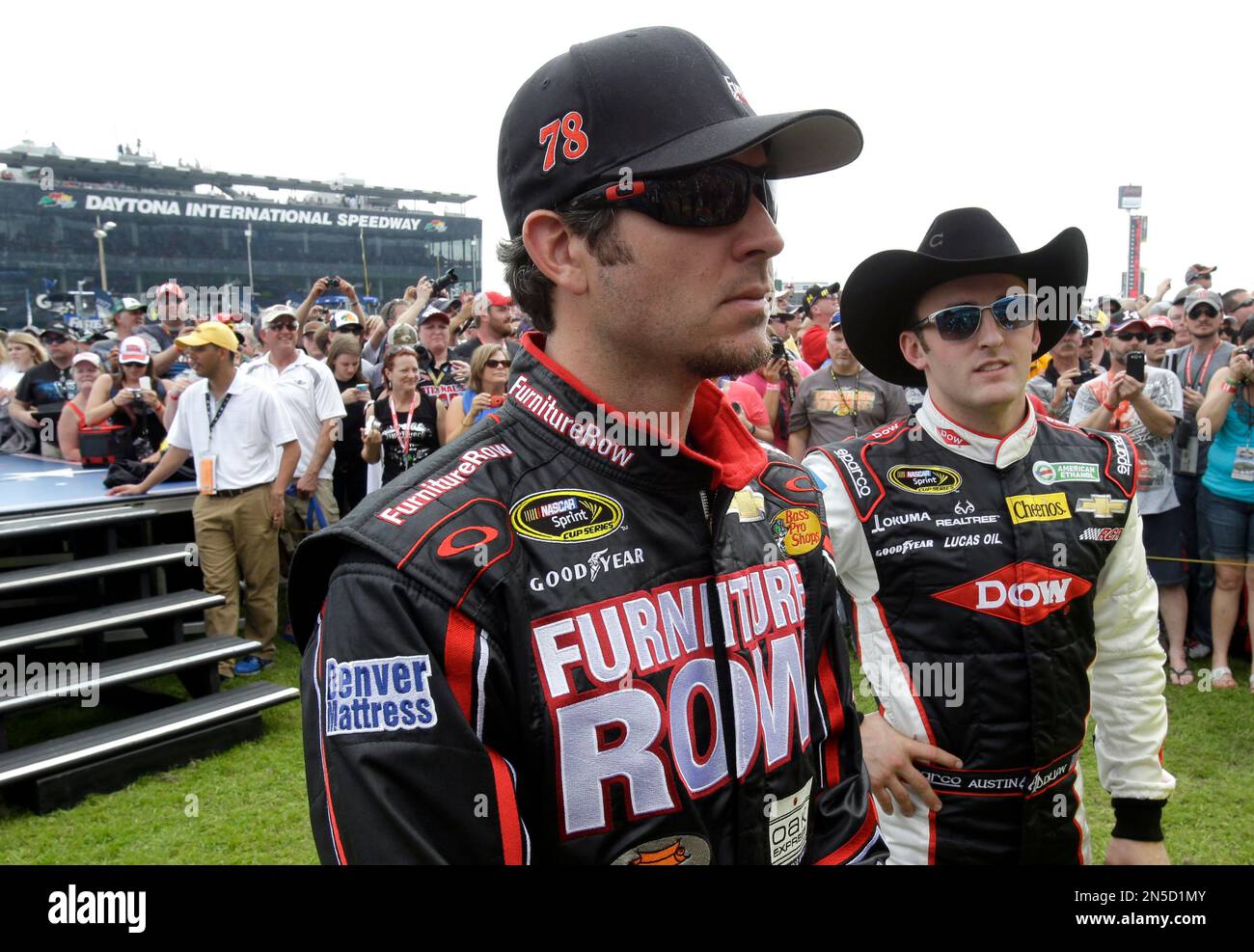 Pole winner Austin Dillon, right, and Martin Truex Jr., left, wait ...