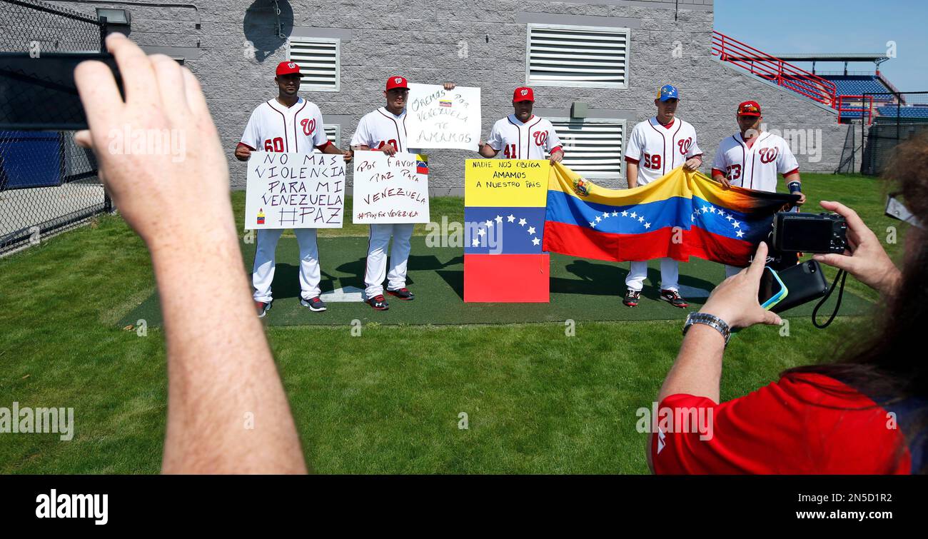 Washington Nationals' Gabriel Alfaro, left, Wilson Ramos, Sandy Leon ...