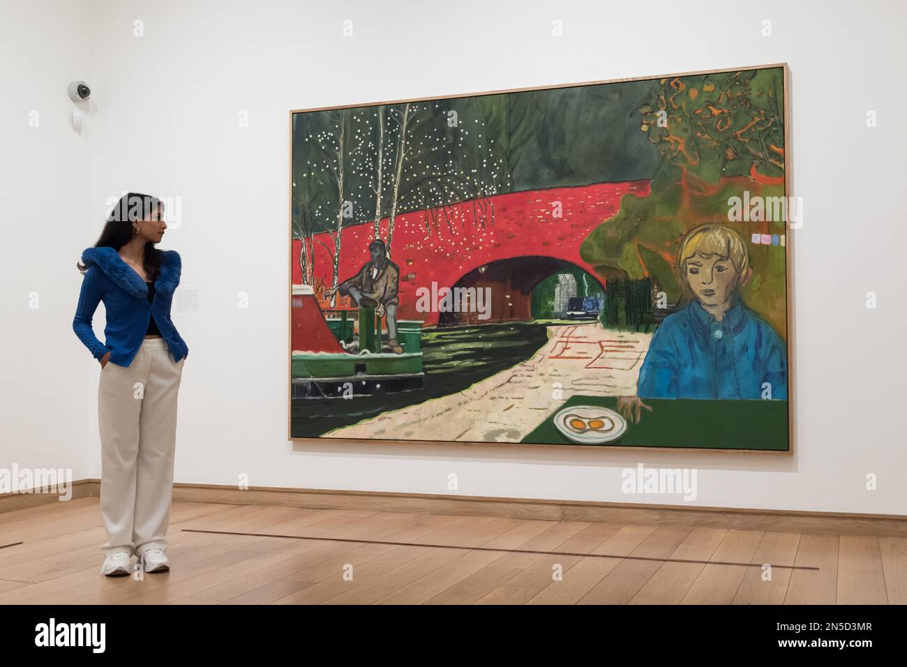 LONDON, UNITED KINGDOM - FEBRUARY 09, 2023: A gallery staff member ...
