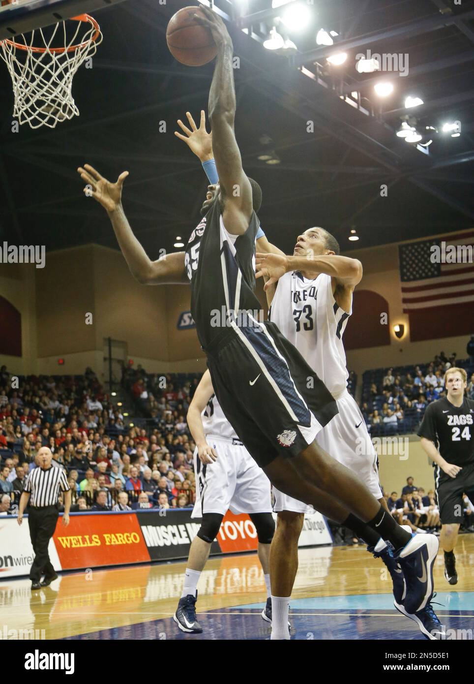 Gonzaga forward Sam Dower spins around San Diego 's Jito Kok to score ...