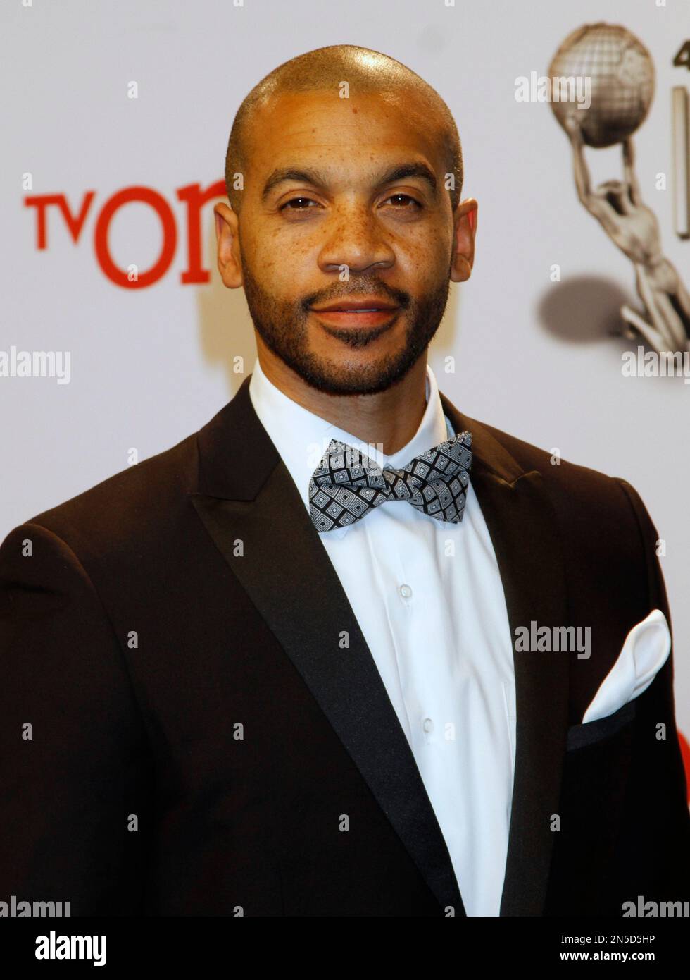 Aaron D. Spears poses in the press room at the 45th NAACP Image Awards ...