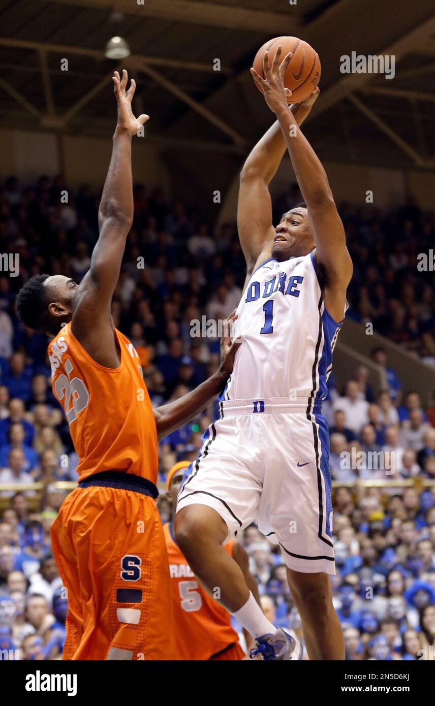 Duke's Jabari Parker (1) drives to the basket as Syracuse's Rakeem ...