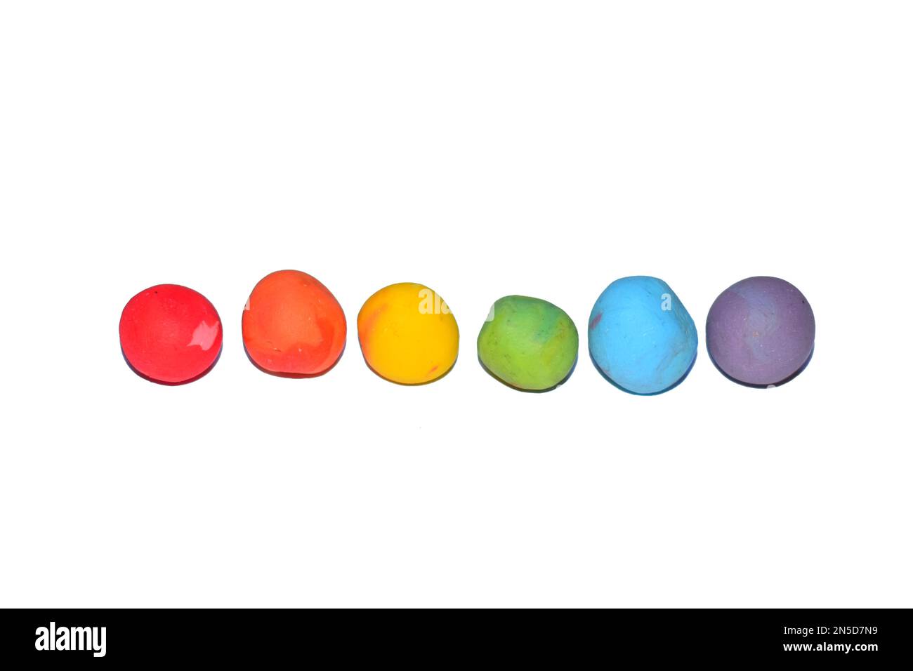 Pride colors balls on a white background Stock Photo - Alamy