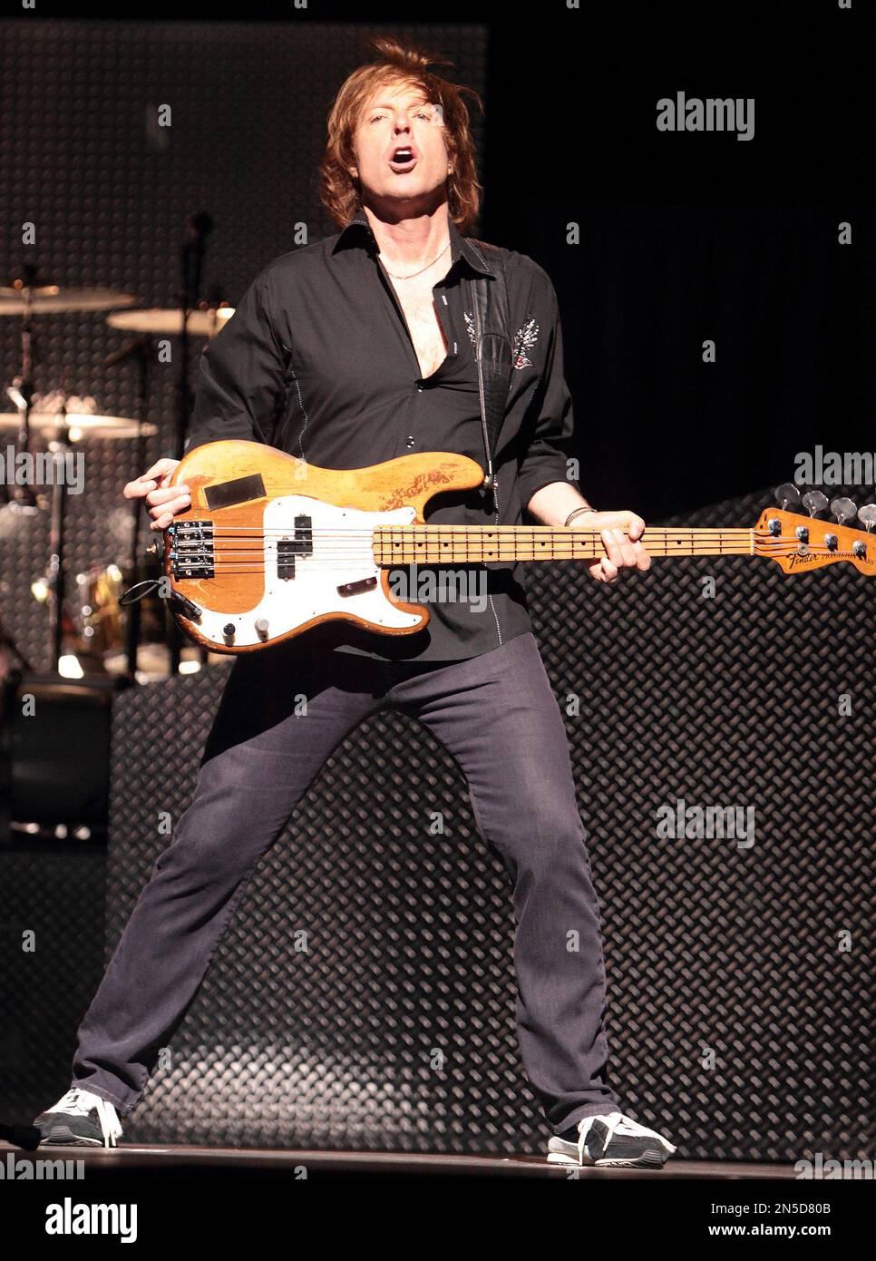 Jeff Pilson of the classic rock band Foreigner performs in concert at ...