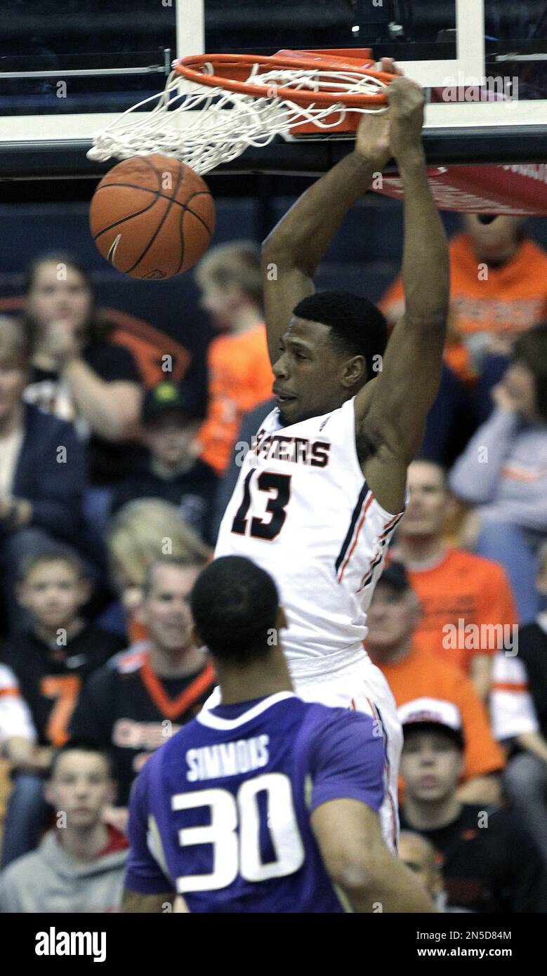 Oregon State guard Langston Morris-Walker, right, scores over ...
