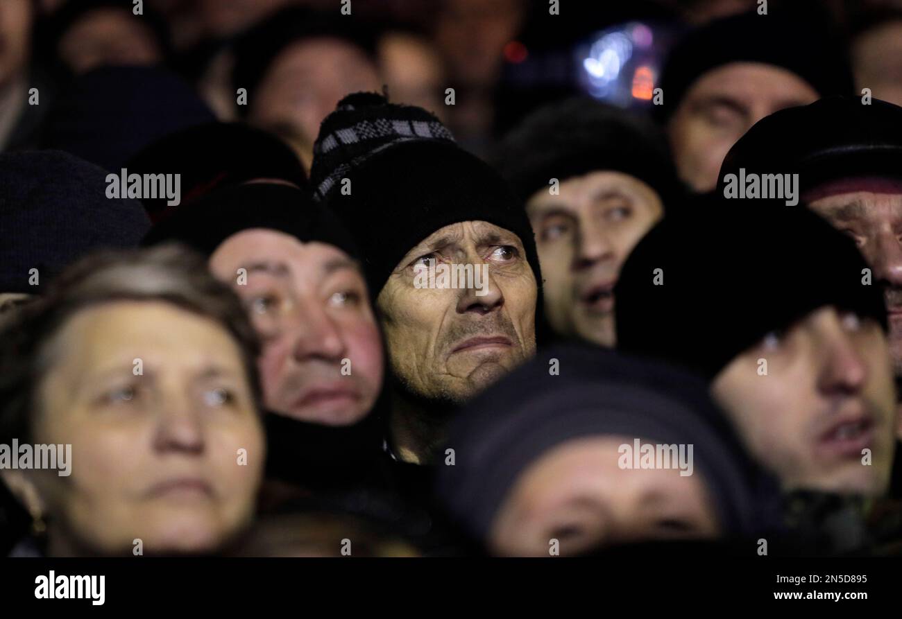 People listen to former Ukrainian prime minister Yulia Tymoshenko in ...