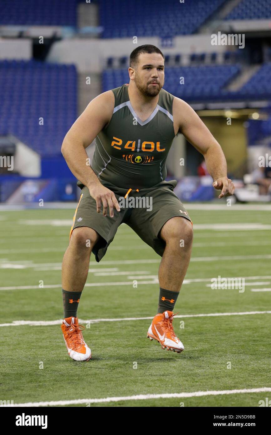 Miami offensive lineman Brandon Linder runs a drill at the NFL football ...