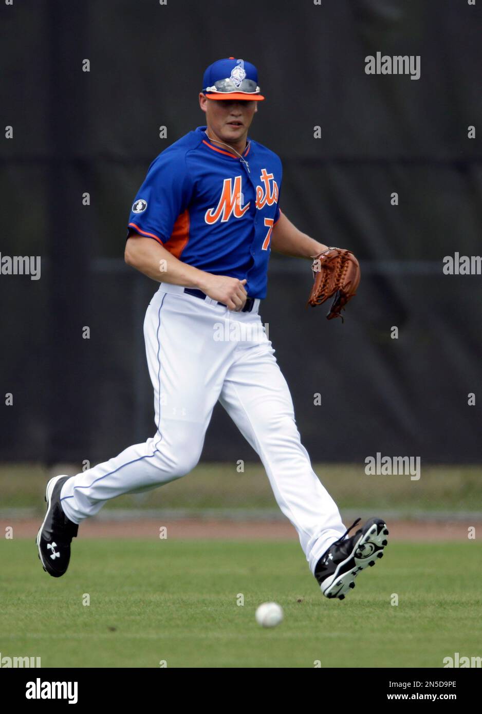 New York Mets outfielder Brandon Nimmo chases down a grounder during ...