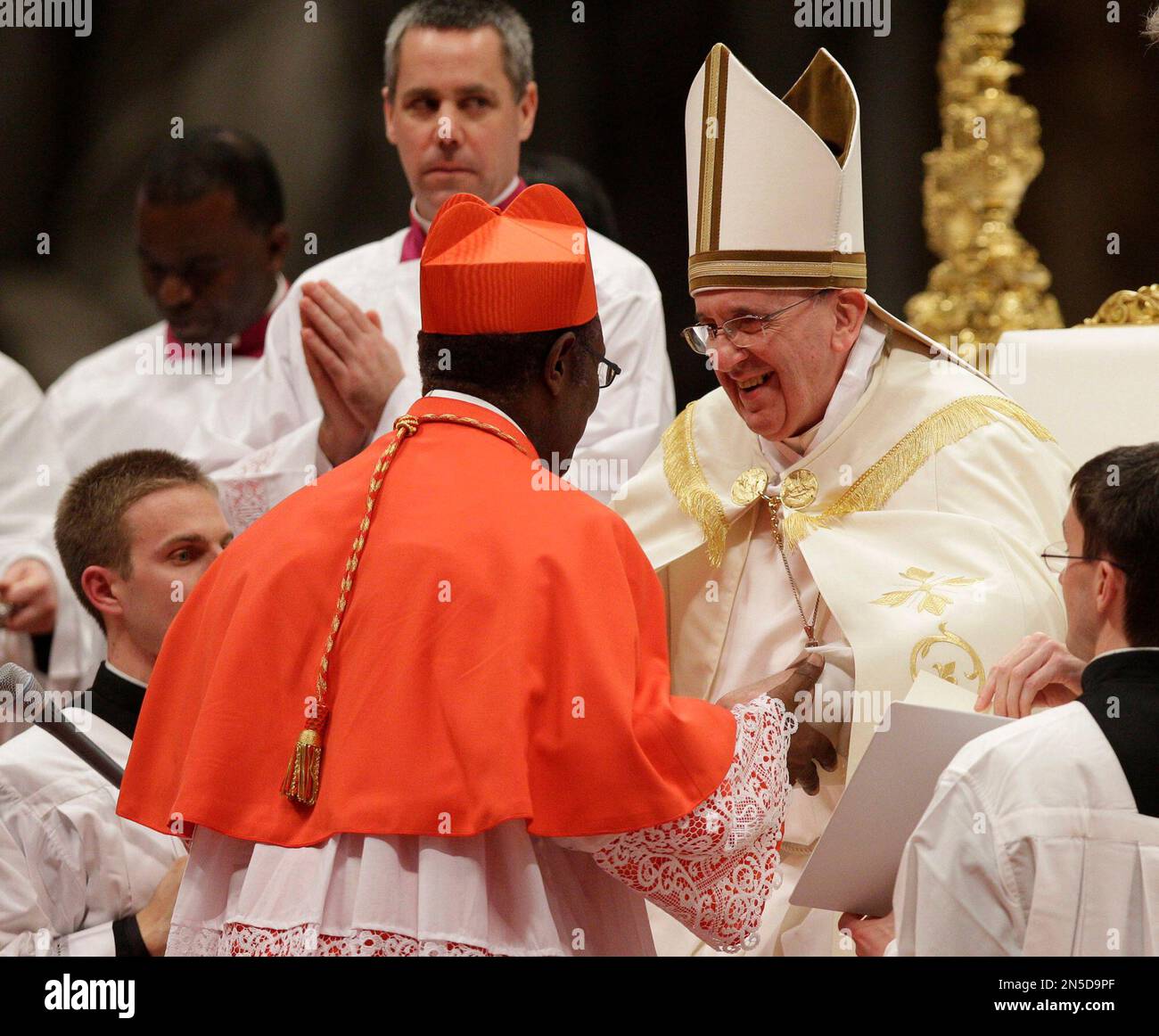 Newly-elected Cardinal Kelvin Edward Felix, archbishop of Castries, is greeted by Pope Francis ...
