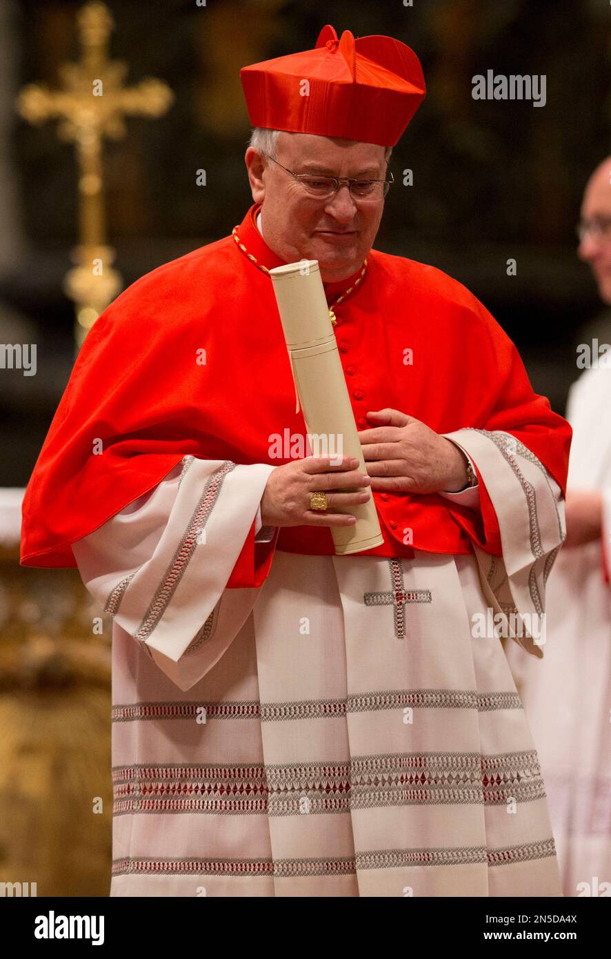 Newly-elected Cardinal Gualtiero Bassetti, of Italy, leaves after he ...