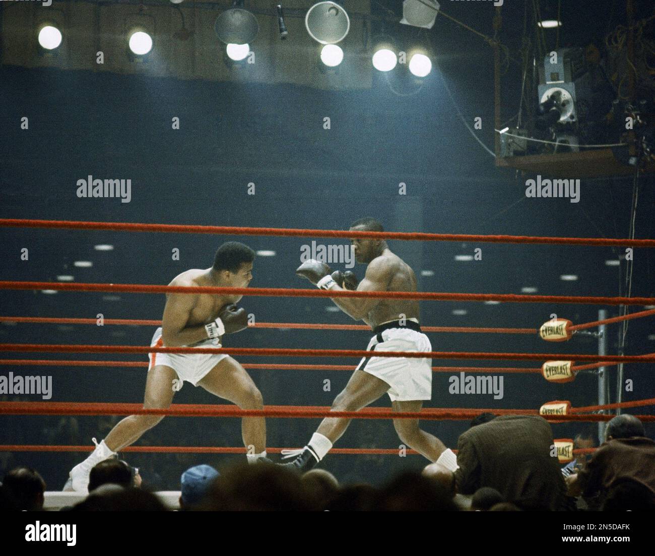 FILE - In this Feb. 25, 1964 file photo, Cassius Clay, left, who later ...