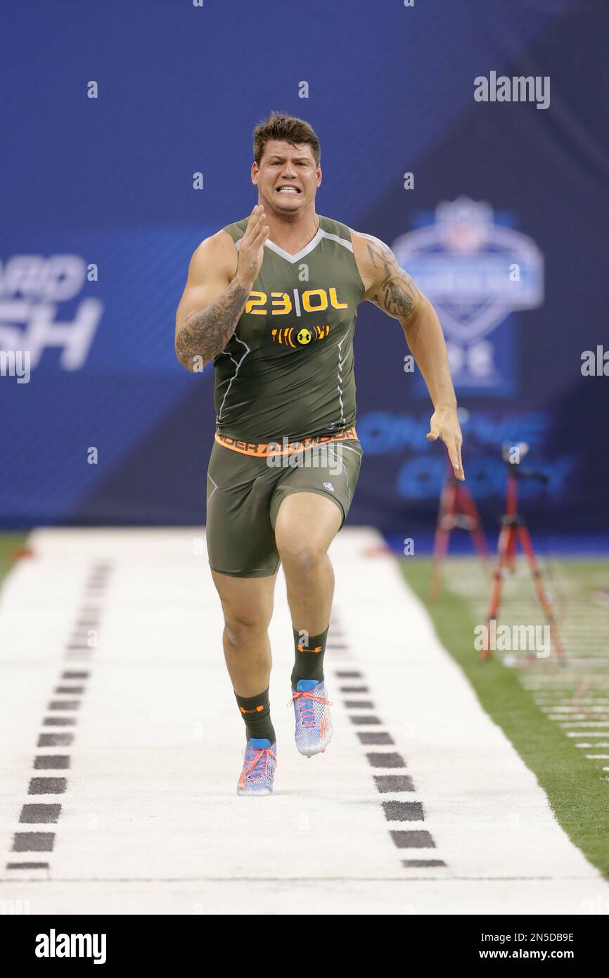 Michigan offensive lineman Taylor Lewan runs the 40-yard dash at the ...