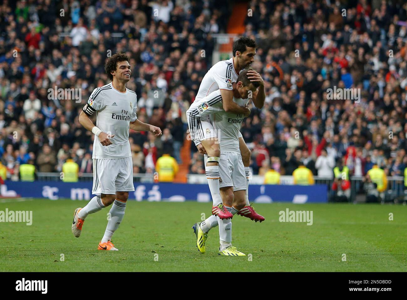 Real's Gareth Bale, right, celebrates his goal with teammates during a ...
