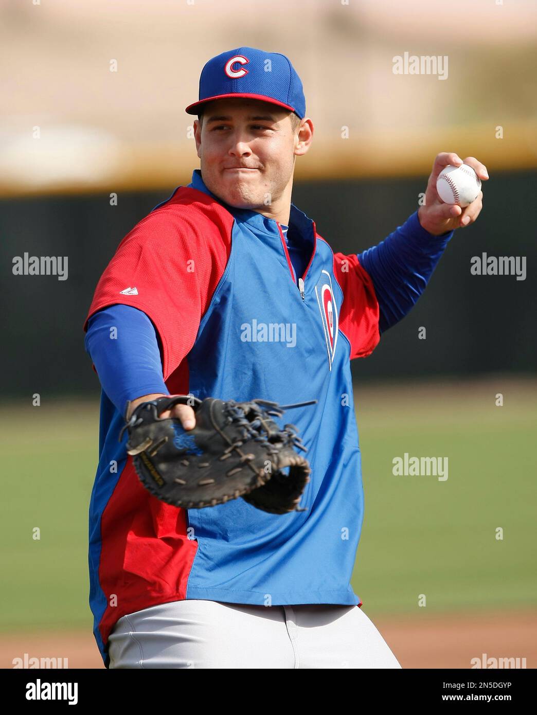 Chicago Cubs first baseman Anthony Rizzo (44) warms up during spring ...