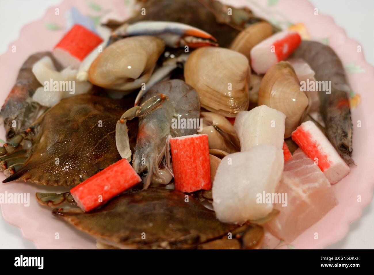background of fresh seafood marine crabs, shrimps, clams, mussels ...