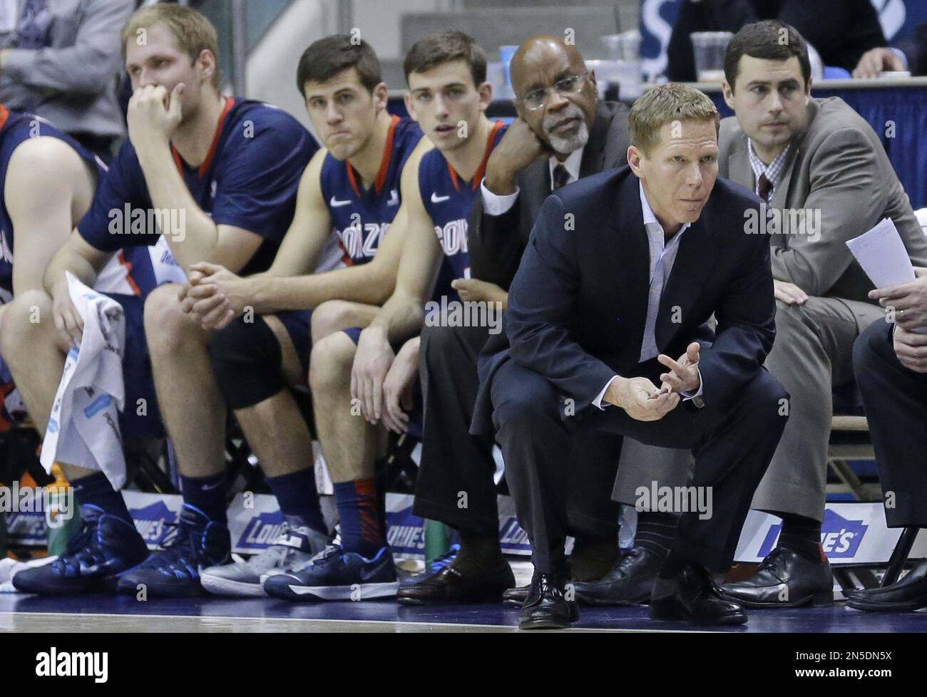 Gonzaga head coach Mark Few and his bench look on in the second half of ...