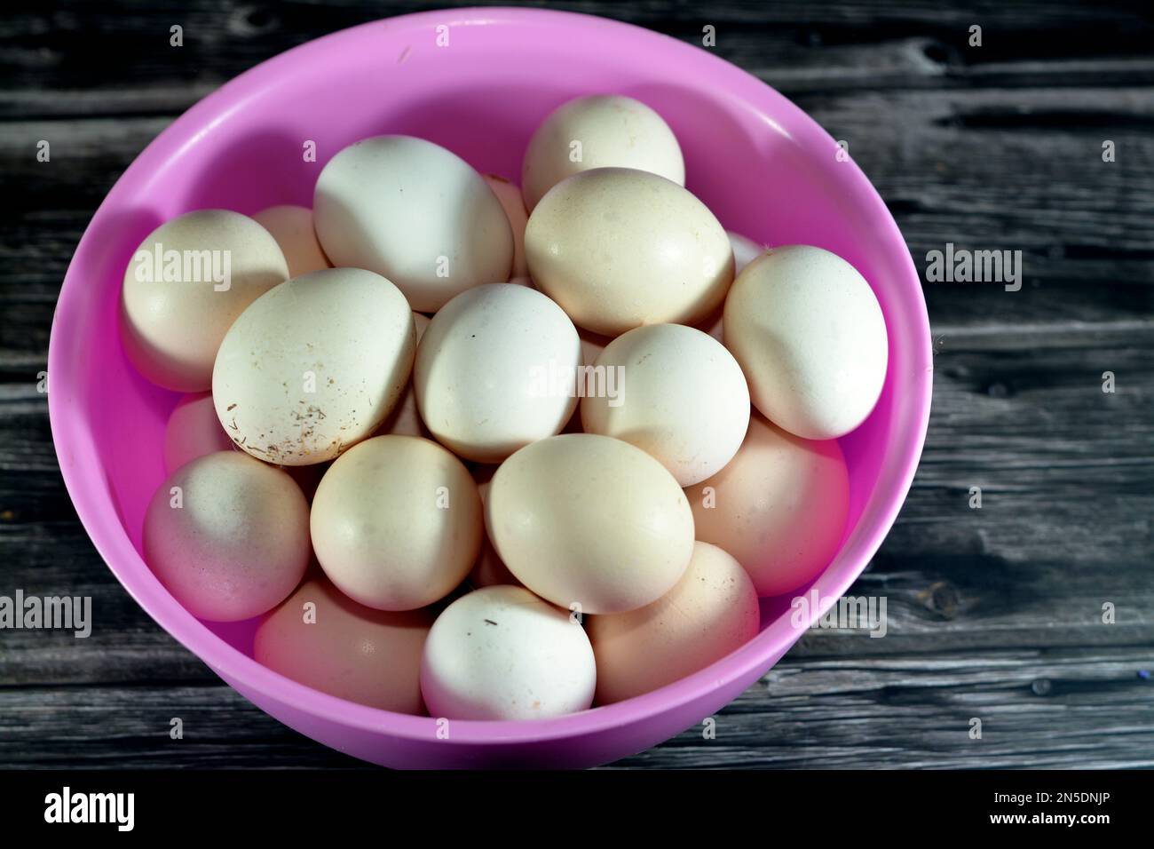 Pile of organic fresh and raw hen chicken eggs, stack of eggs isolated ...