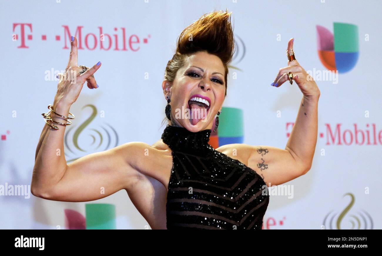 Mexican rock singer Alejandra Guzman poses for photographers on the red ...