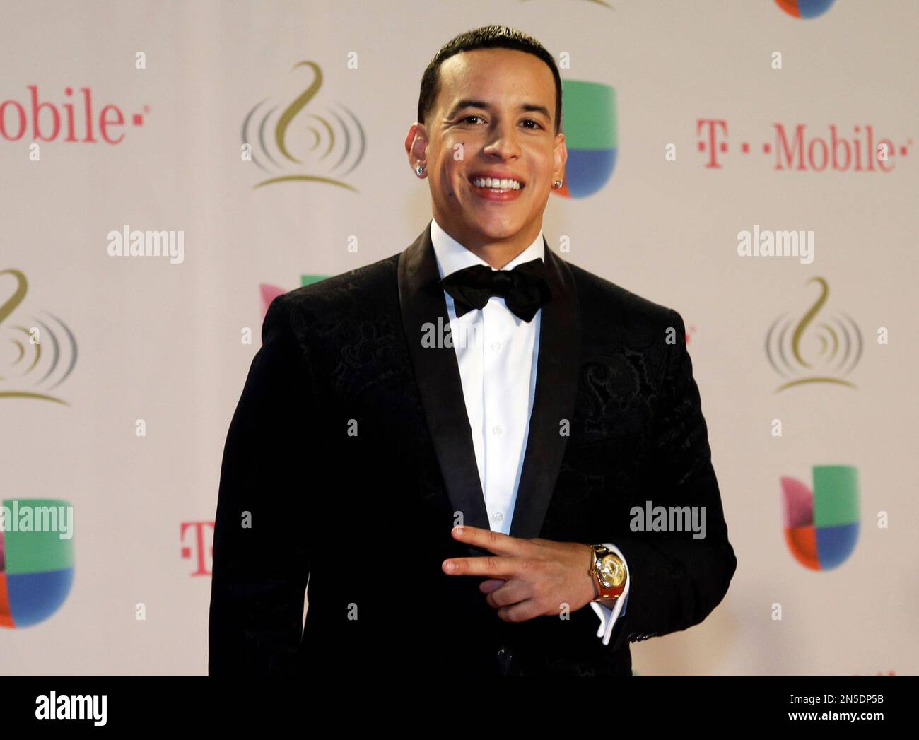 Reggaeton singer Daddy Yankee, of Puerto Rico, poses for photographers ...