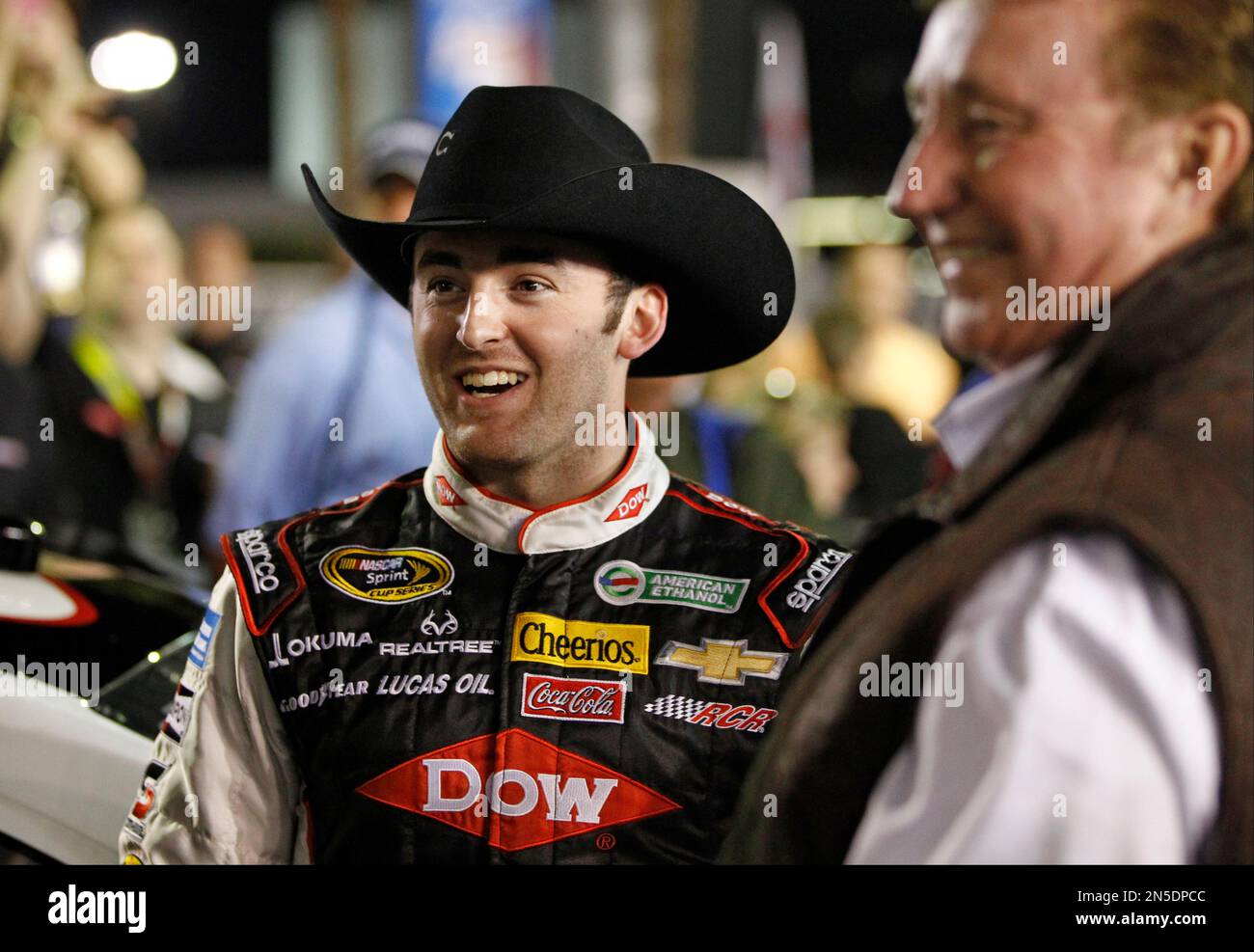 Austin Dillon, left, smiles with team owner Richard Childress, right ...