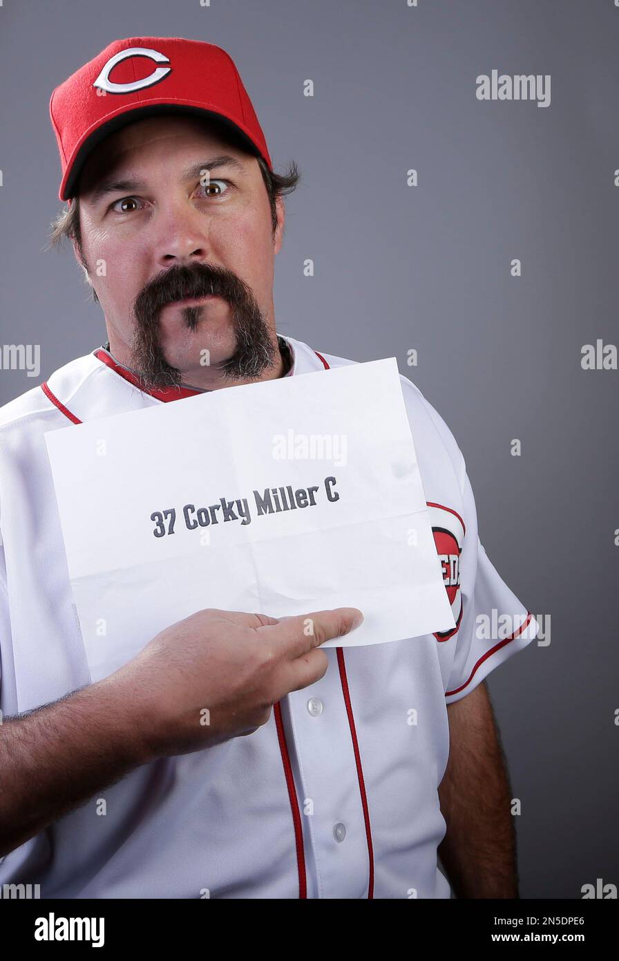 Cincinnati Reds catcher Corky Miller jokes as he poses for a picture ...