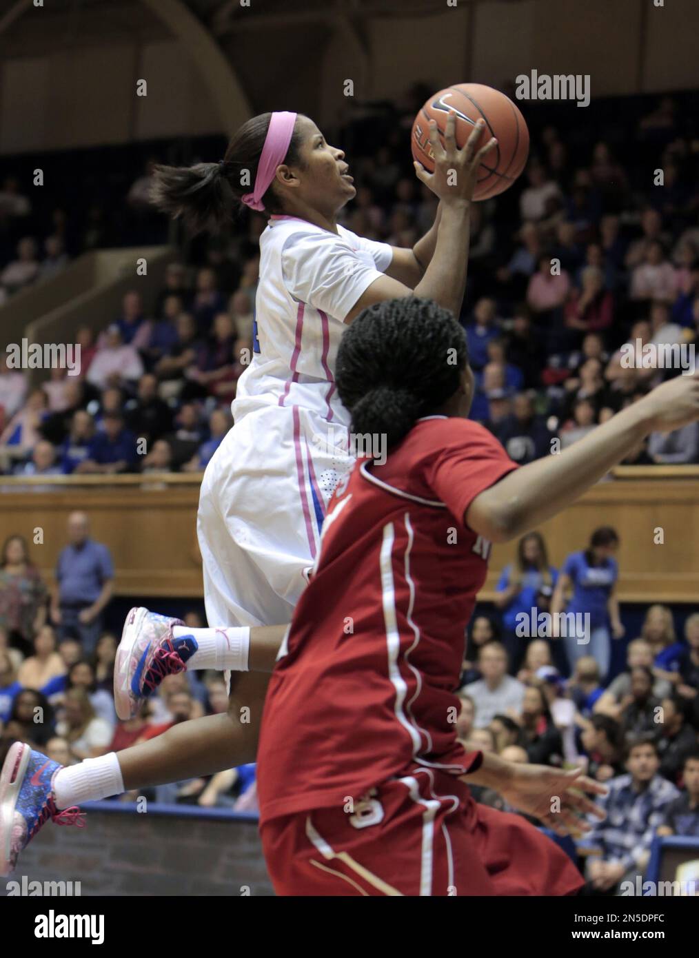 Duke's Ka'lia Johnson drives to the basket above NC State's Len'Nique ...