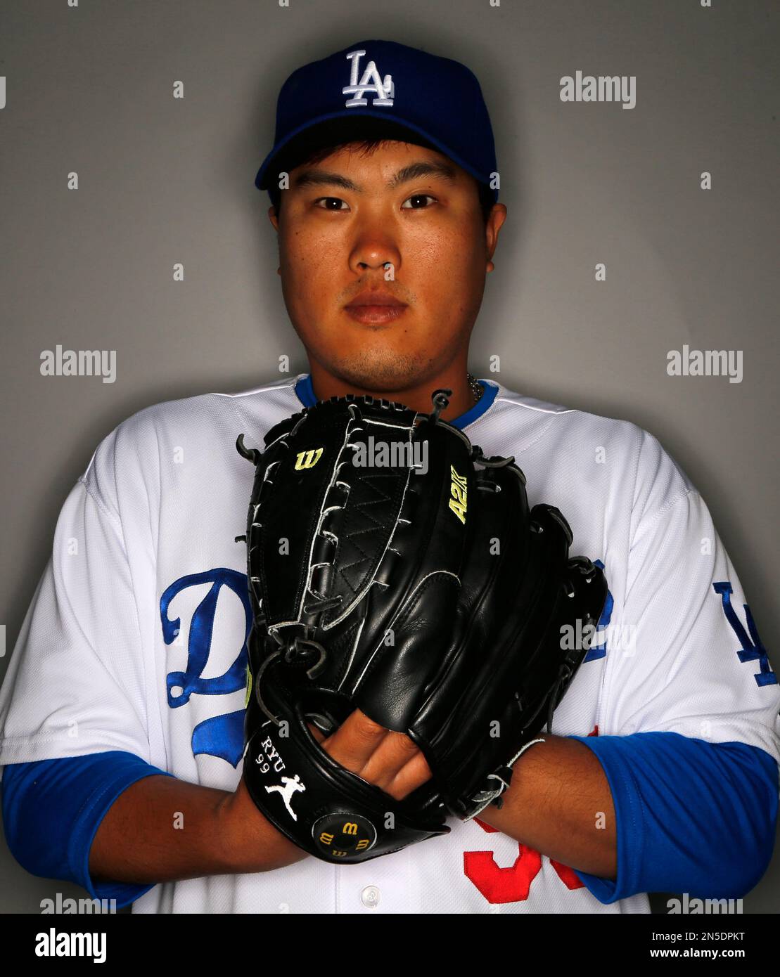 Los Angeles Dodgers pitcher Hyun-Jin Ryu, of South Korea, poses for a ...