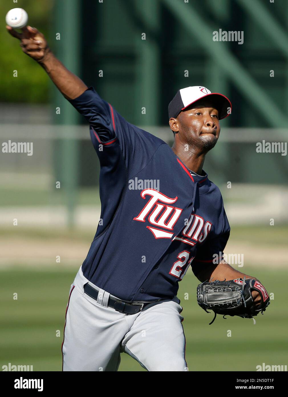 Minnesota Twins pitcher Samuel Deduno works out on the field during ...