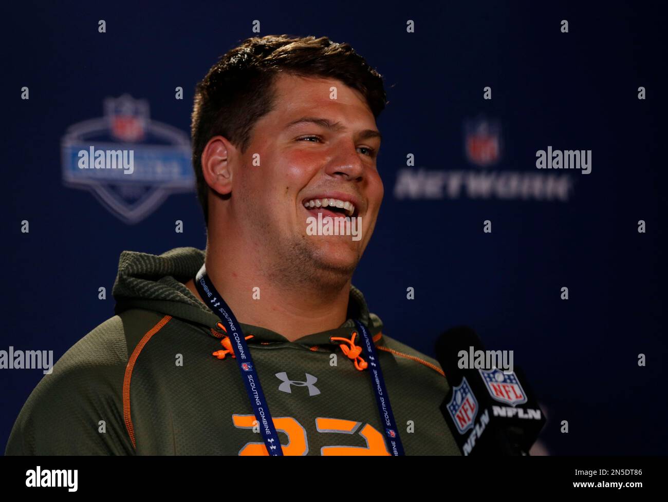 Michigan offensive lineman Taylor Lewan answers a question during a ...