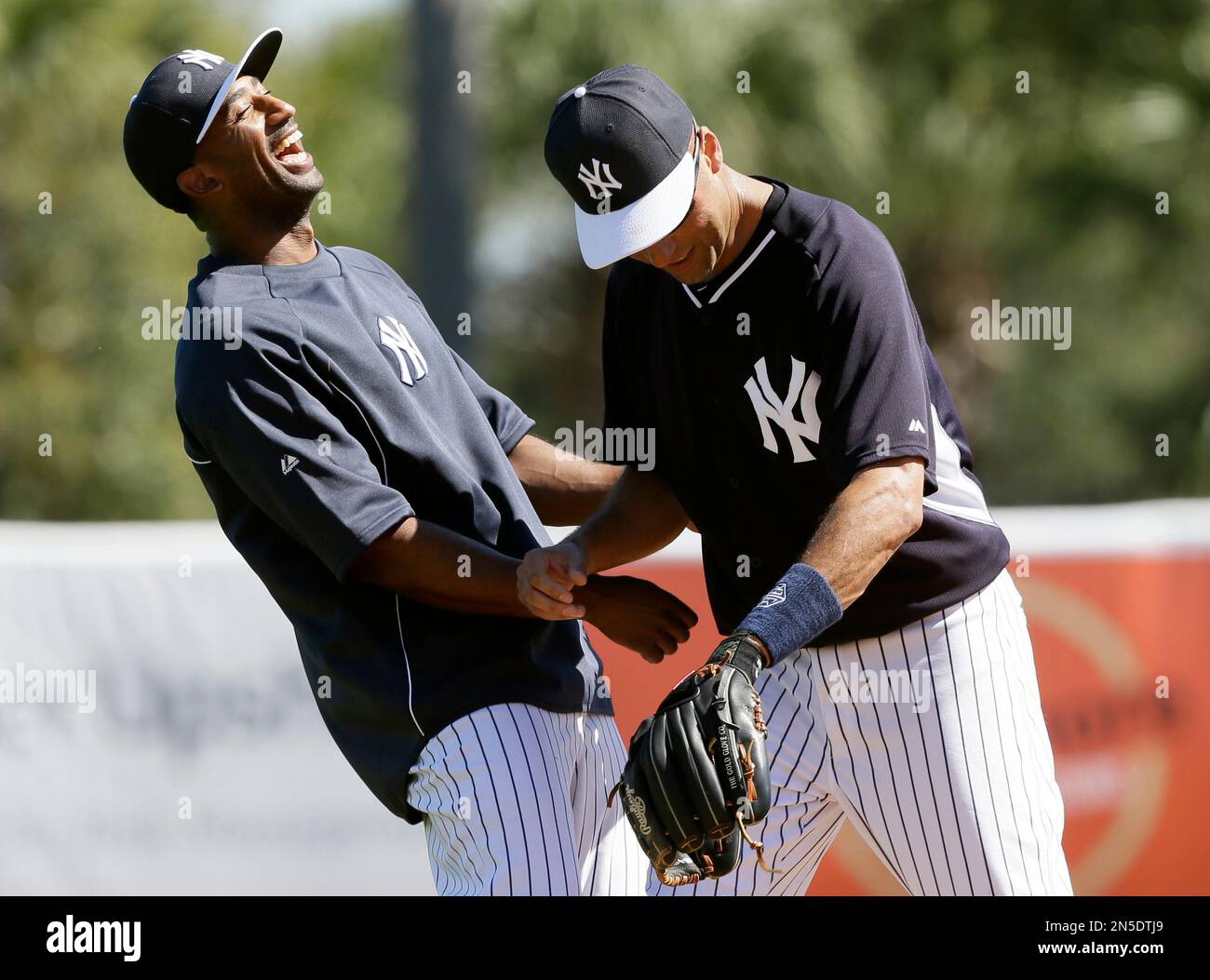 New York Yankees shortstop Eduardo Nunez, left, laughs with teammate ...
