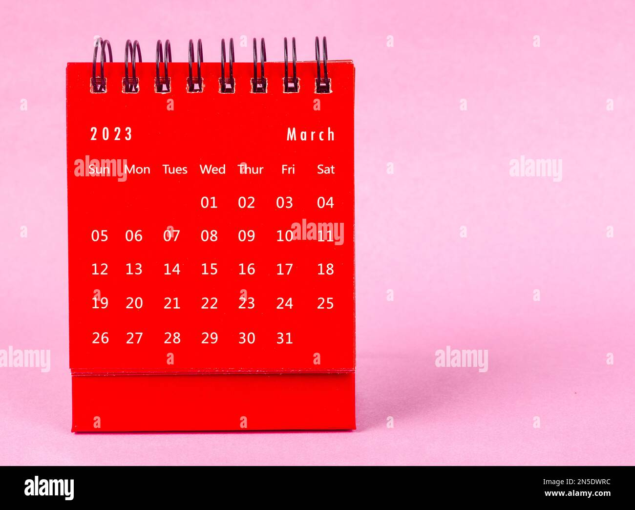 Red March 2023 Monthly desk calendar for 2023 year on pink background ...