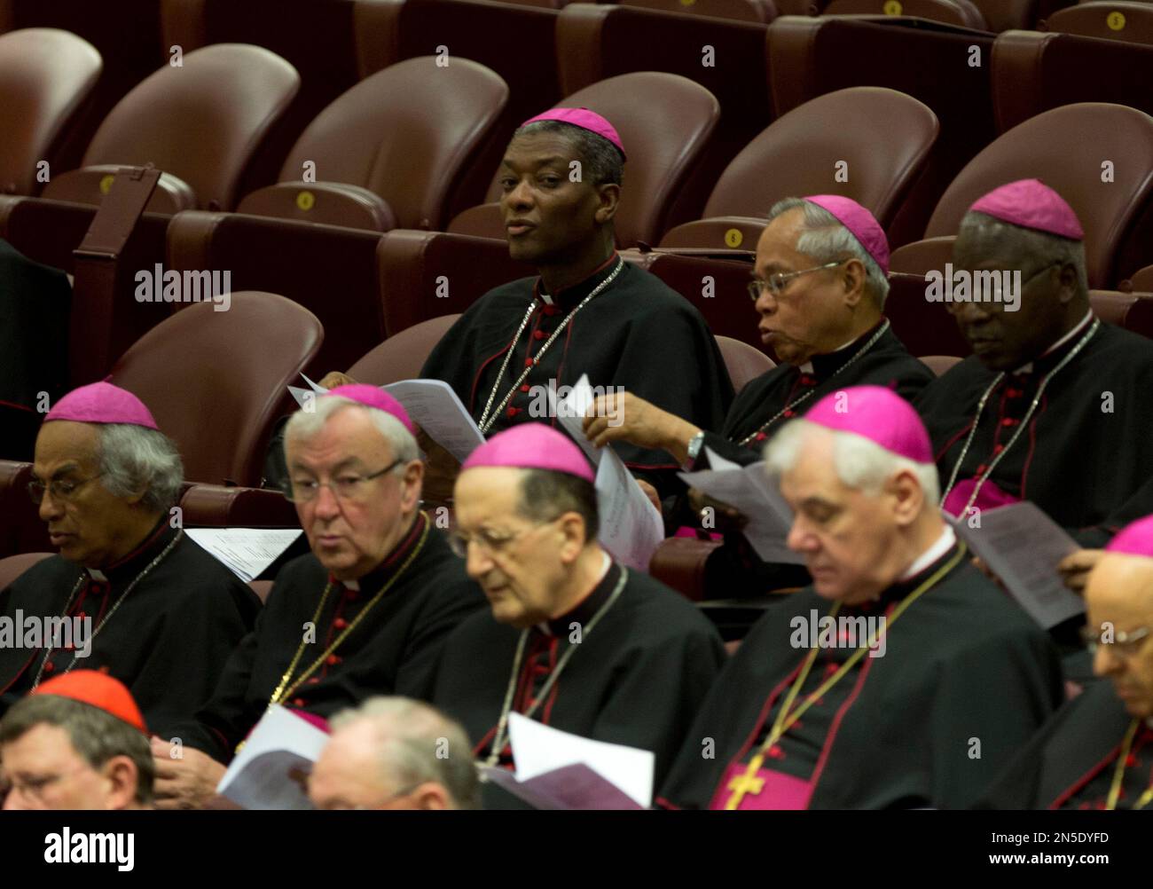 ADDS NAME OF ARCHBISHOP OF THE PHILIPPINES. Bishops, wearing purple ...