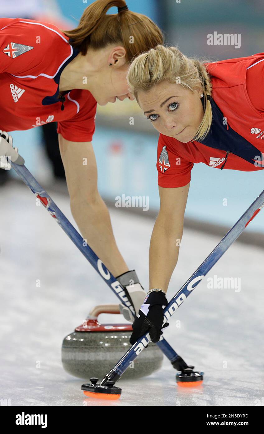 Britain's Anna Sloan, right, and Claire Hamilton, left, sweep ahead of ...