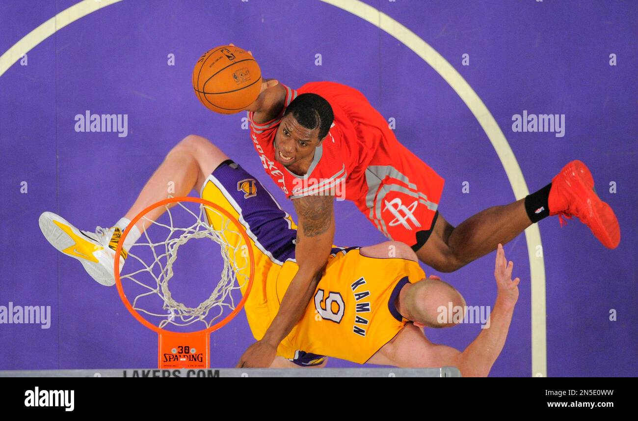 Houston Rockets forward Terrence Jones, top, puts up a shot as Los ...