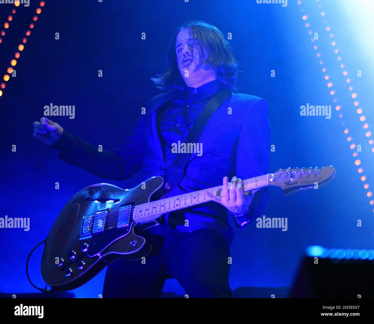 Jamie Cook of the rock band Arctic Monkeys performs in concert at ...