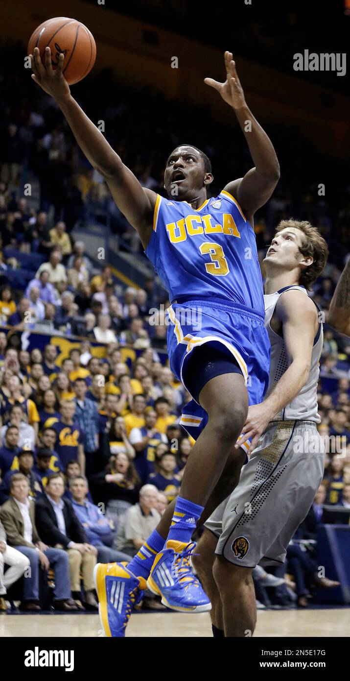 UCLA's Jordan Adams (3) lays up a shot past California's Ricky Kreklow ...