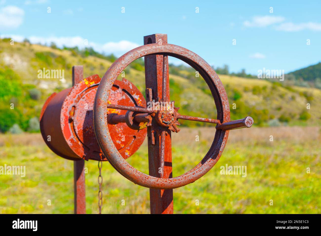 Rusty well mechanism with chain for extracting underground water Stock ...
