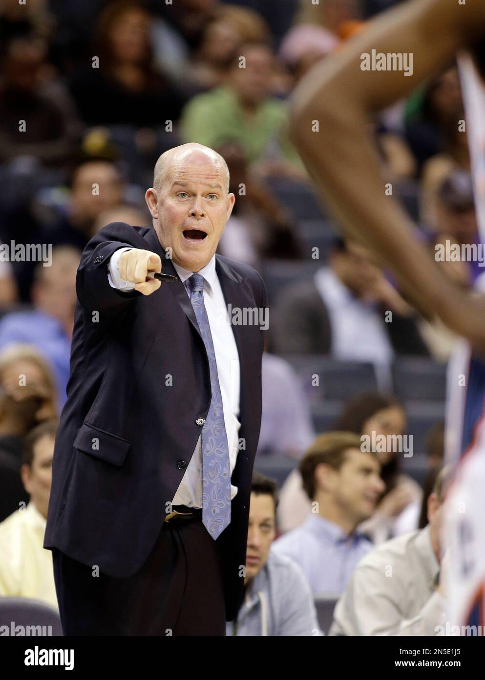 Charlotte Bobcats' head coach Steve Clifford directs his players ...
