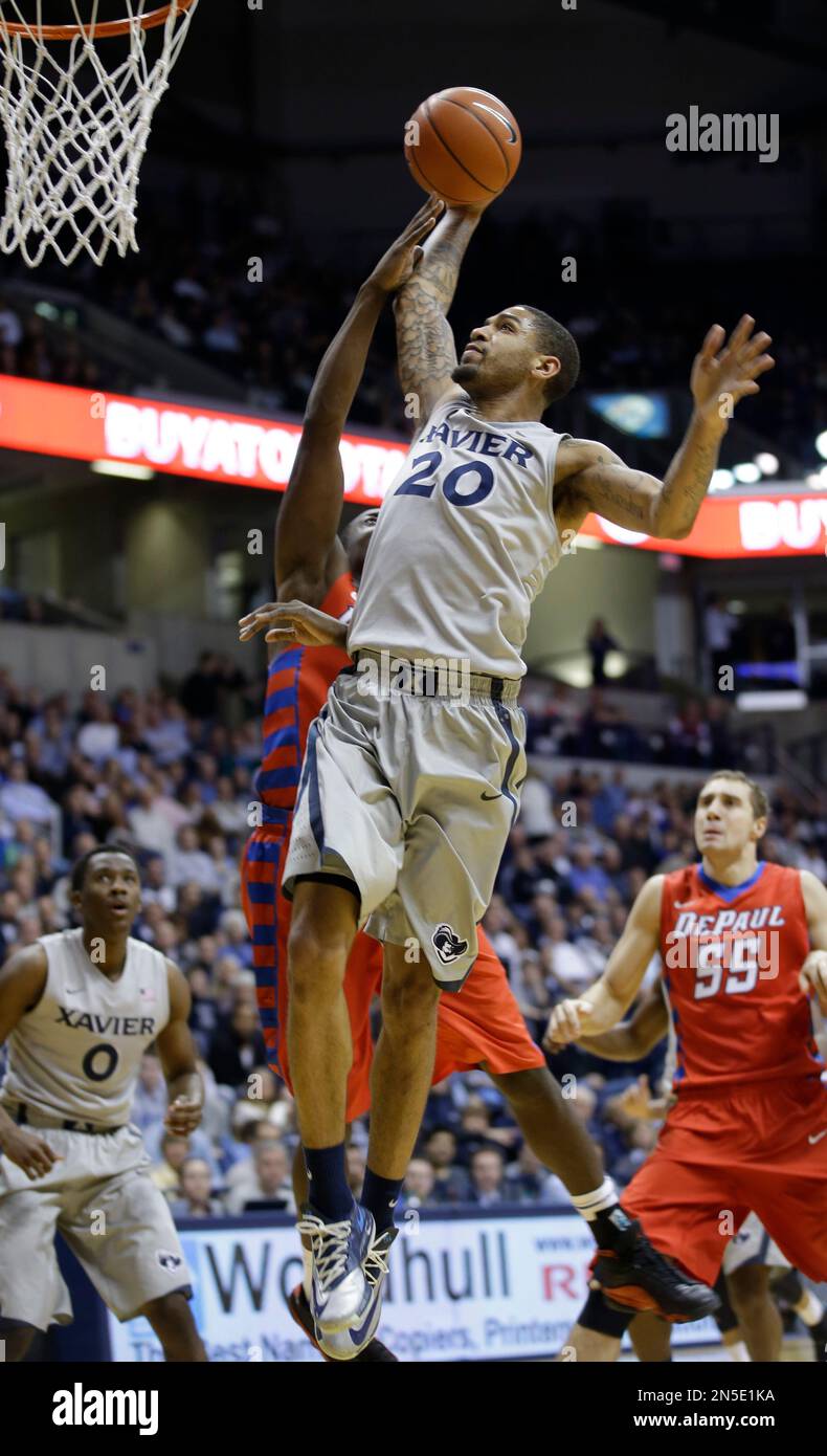 Xavier forward Justin Martin (20) shoots against DePaul in the first ...