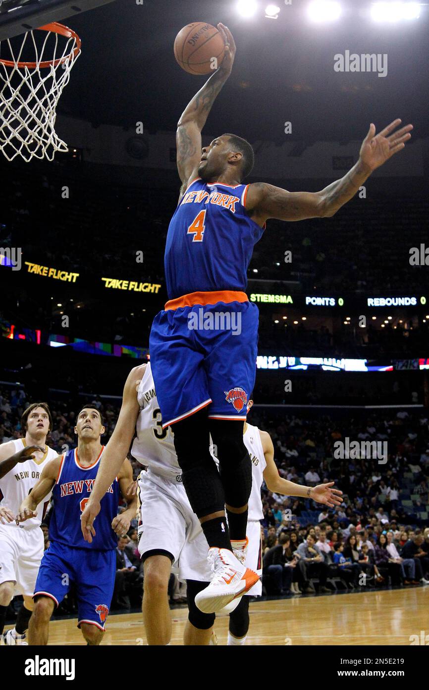 New York Knicks power forward Jeremy Tyler (4) dunks the ball during ...