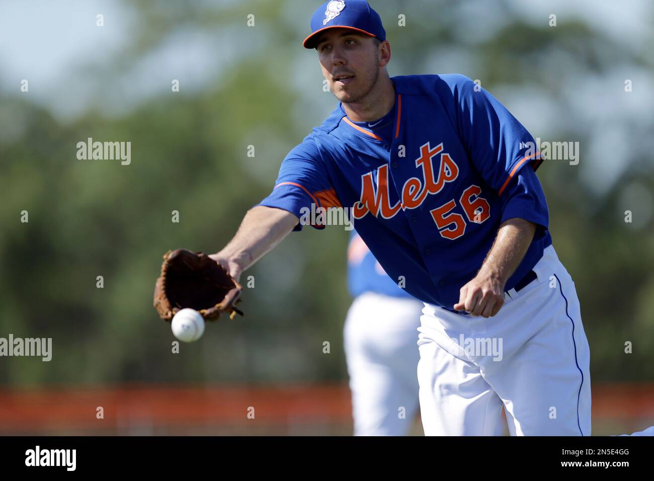 New York Mets pitcher Scott Rice flips the ball home during spring ...